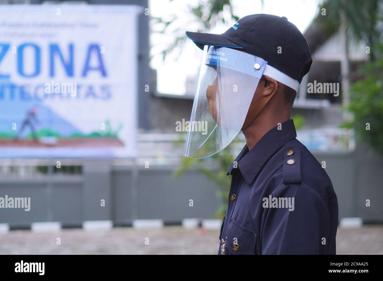 security guards use face shields Stock Photo - Alamy