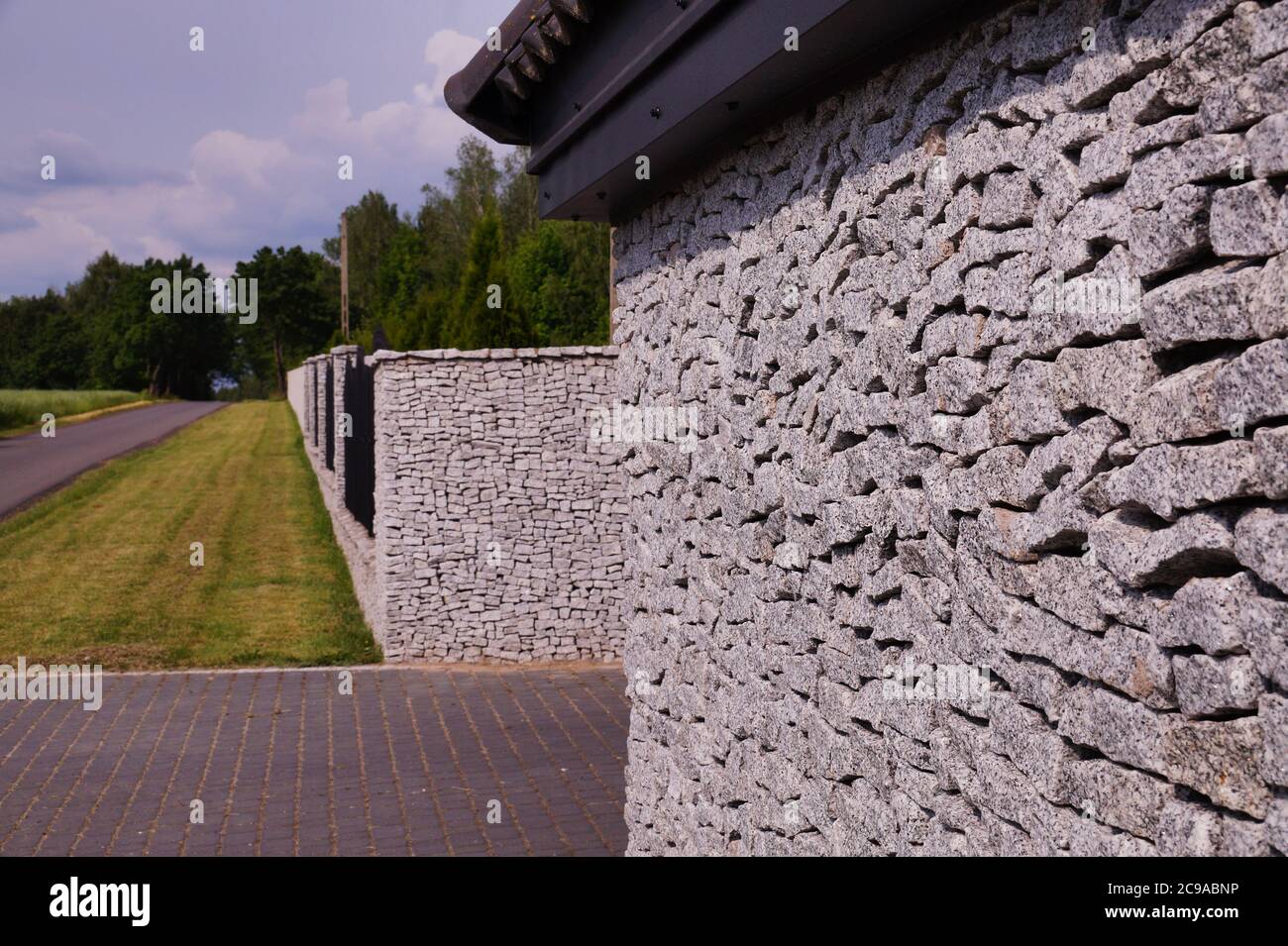 Fence. Impressive and very durable fence of the property made of split ...