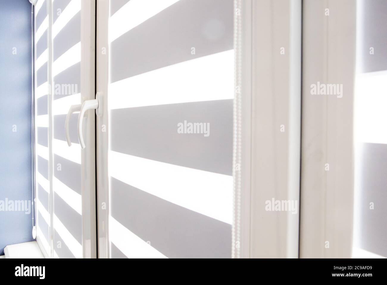 closed window or door with metal jalousie. Office meeting room lighting ...