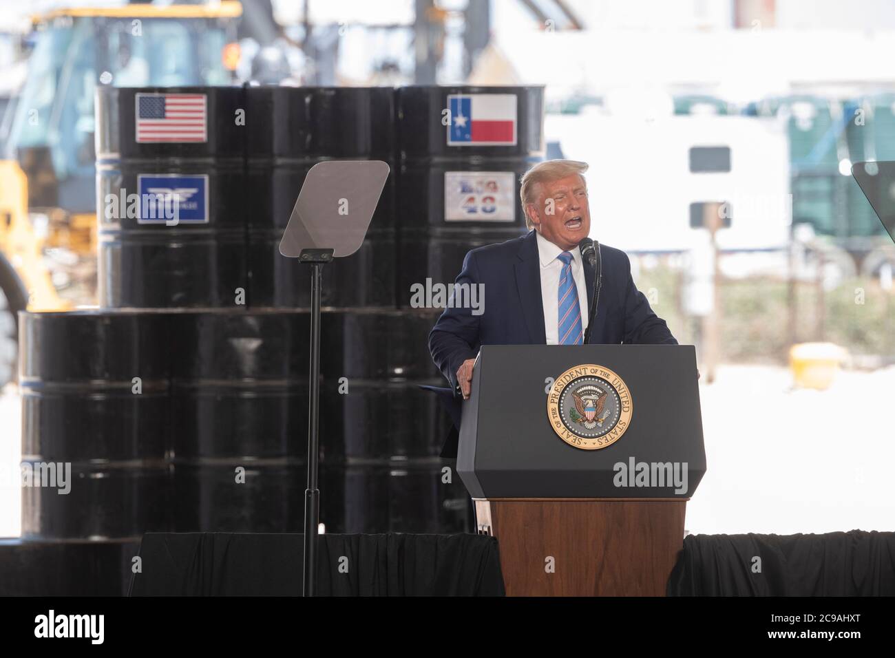 Midland, TX USA July 29, 2020: With black oil drums serving as a ...