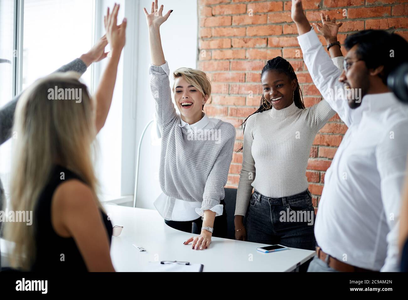 Office workers celebrating hi-res stock photography and images - Alamy