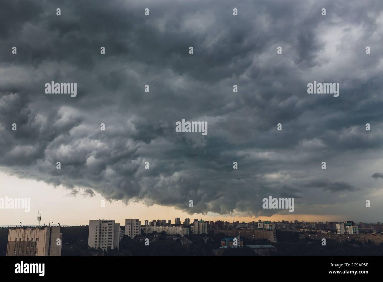 Before heavy rain storm. On the sky is covered all over by the clouds ...