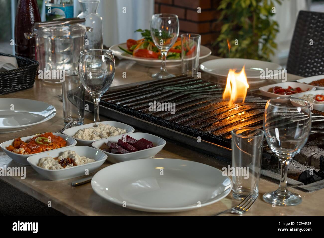 Different types of meat grilled on Barbecue on the table, Served with ...