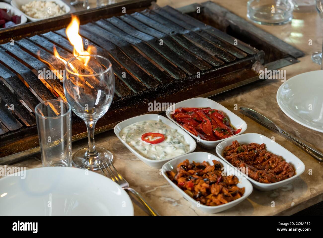 Different types of meat grilled on Barbecue on the table, Served with ...