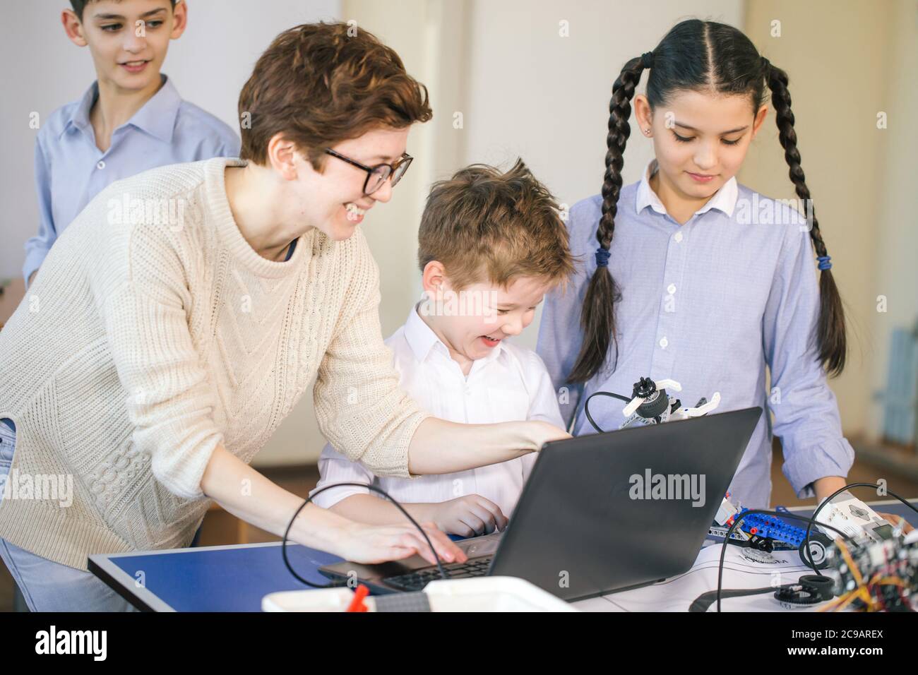 Robot child help hi-res stock photography and images - Alamy