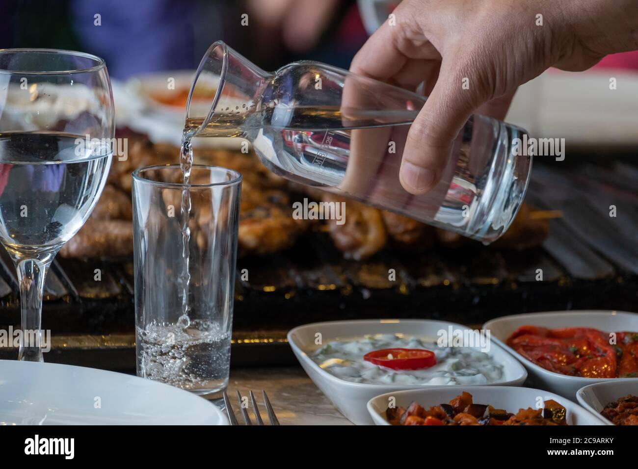 Different types of meat grilled on Barbecue on the table, Served with ...
