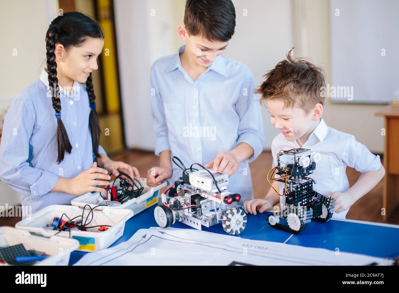 Modern . Group of caucasian kids having fun participating in the ...