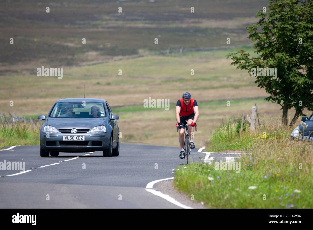 Cyclist overtake hi-res stock photography and images - Alamy