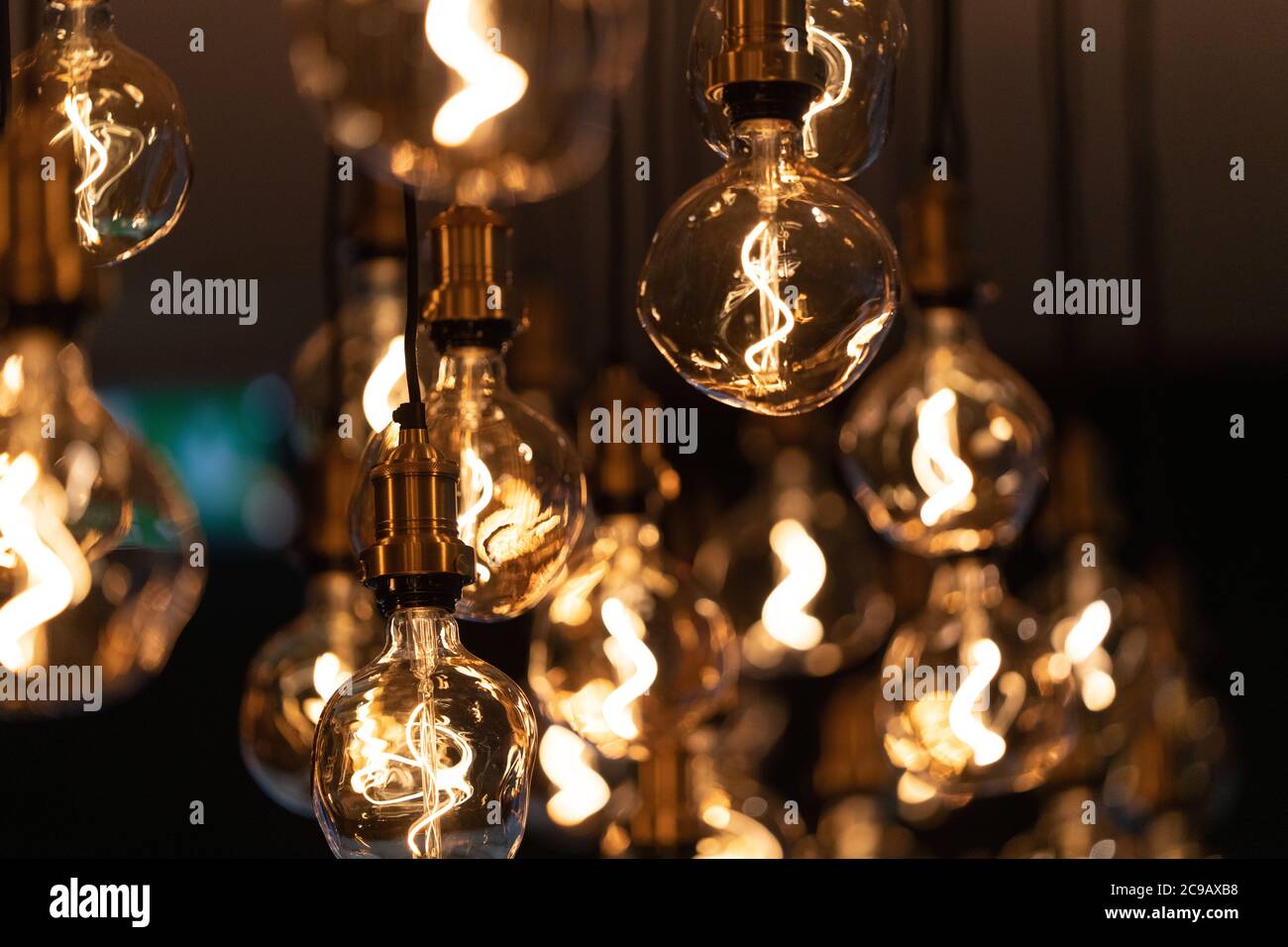 Light Bulbs and their glowing Tungsten filaments Stock Photo - Alamy
