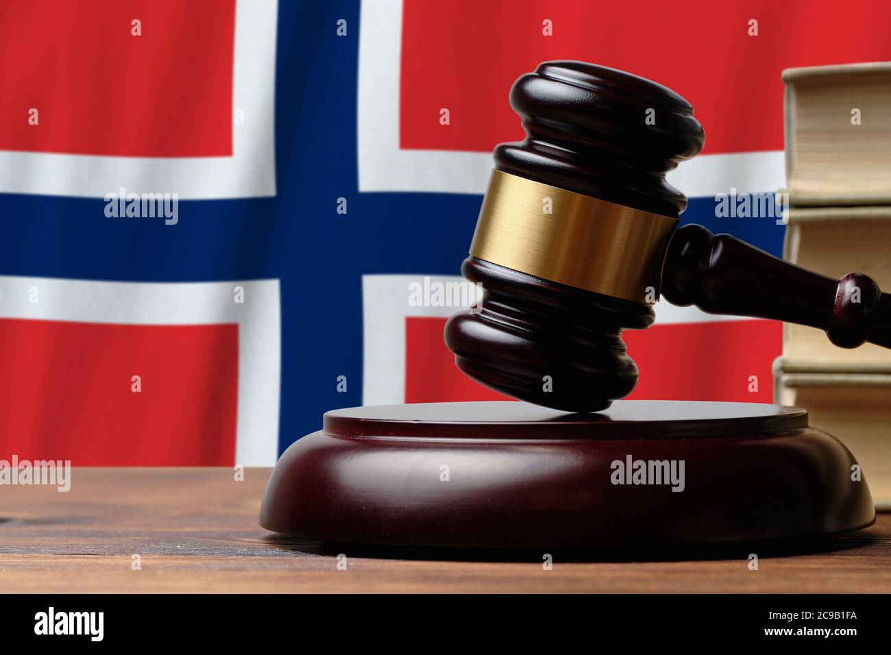 Justice and court concept in Kingdom of Norway. Judge hammer on a flag ...