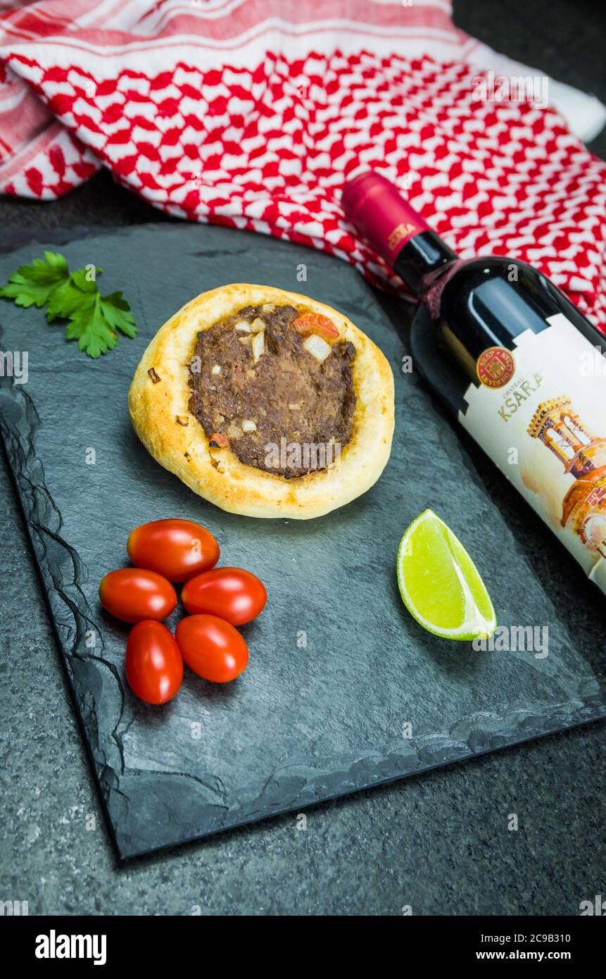 Delicious Lebanese (Arabic) food, legitimate sfihas on a black granite ...