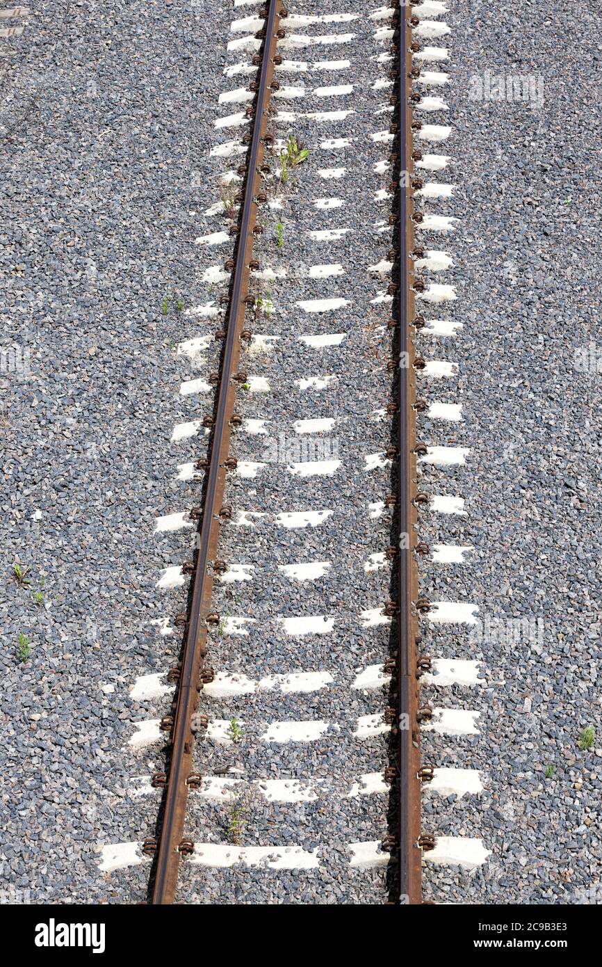 the railway goes on the ground Stock Photo - Alamy
