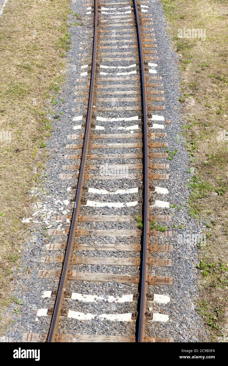 the railway goes on the ground Stock Photo - Alamy