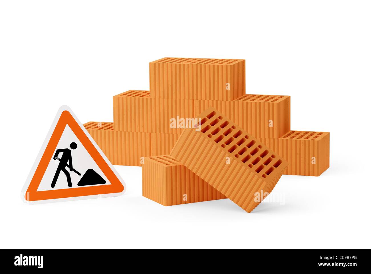 Stack of red brick stones with two single bricks in front and road ...