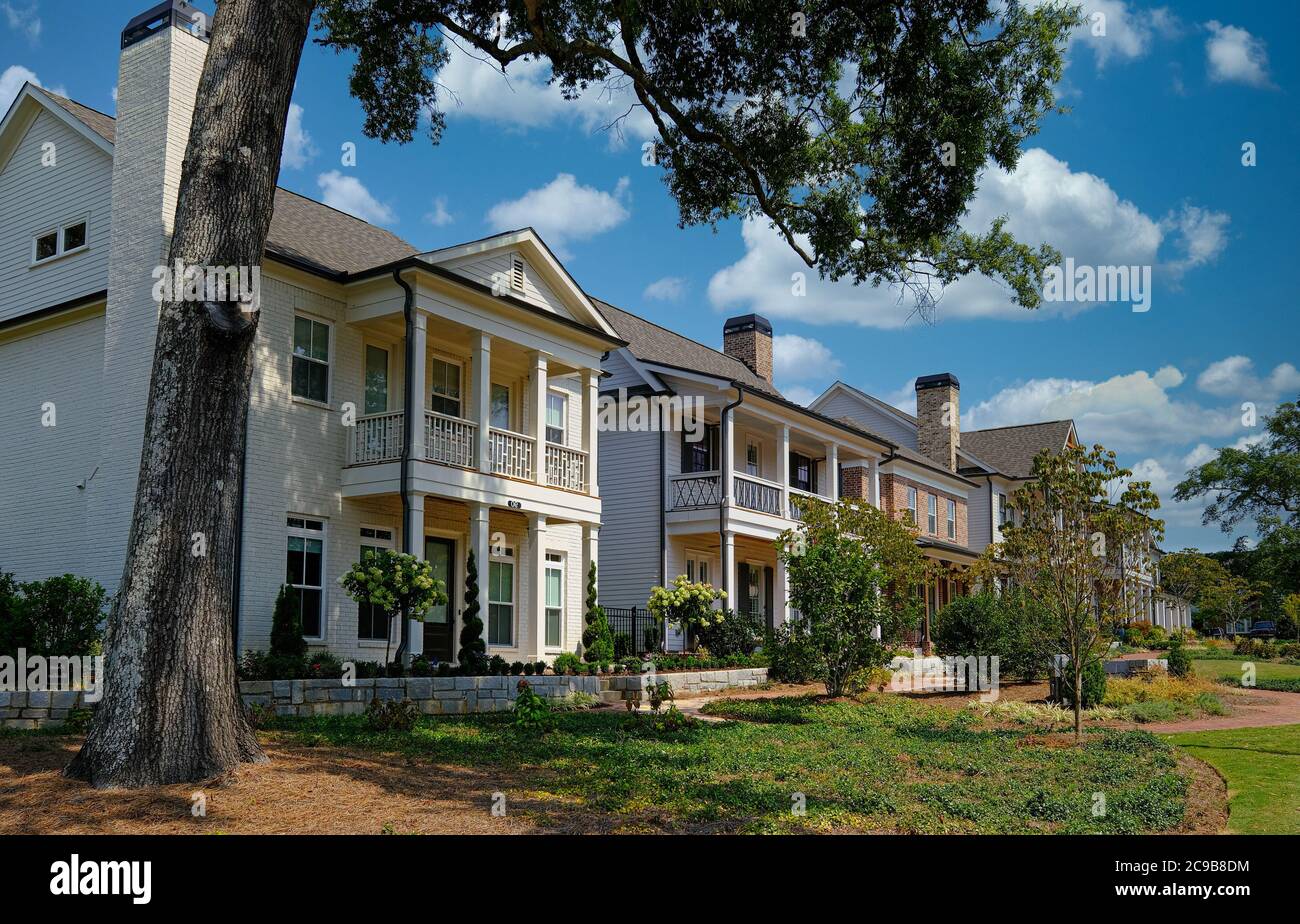 Large Rowhouses by Town Park Stock Photo - Alamy