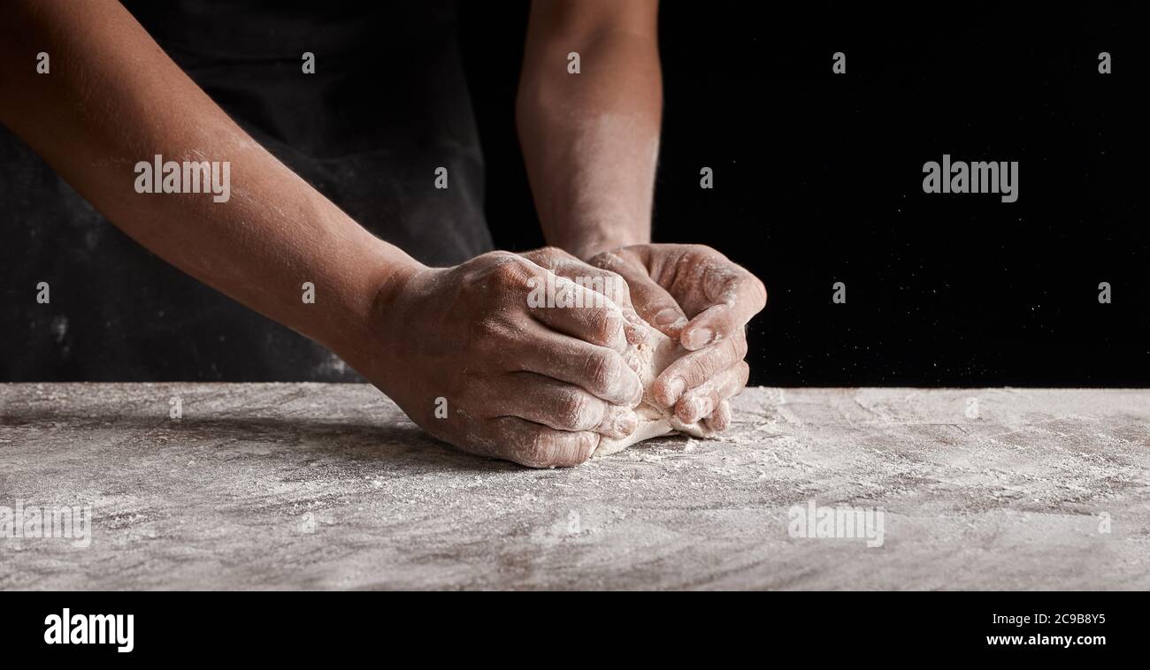 Professional chef crafting bread in process Stock Photo - Alamy