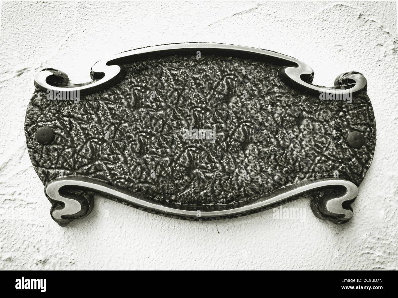 empty metal memorial plaque on wall Stock Photo - Alamy