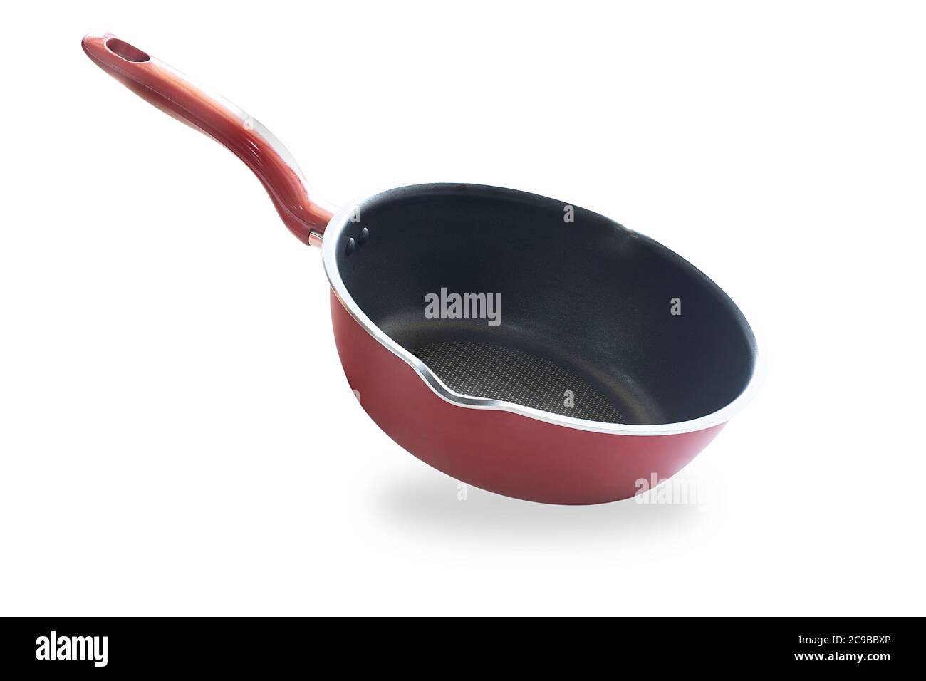 Modern non stick surface frying pan or skillet or sauce pan in red and ...