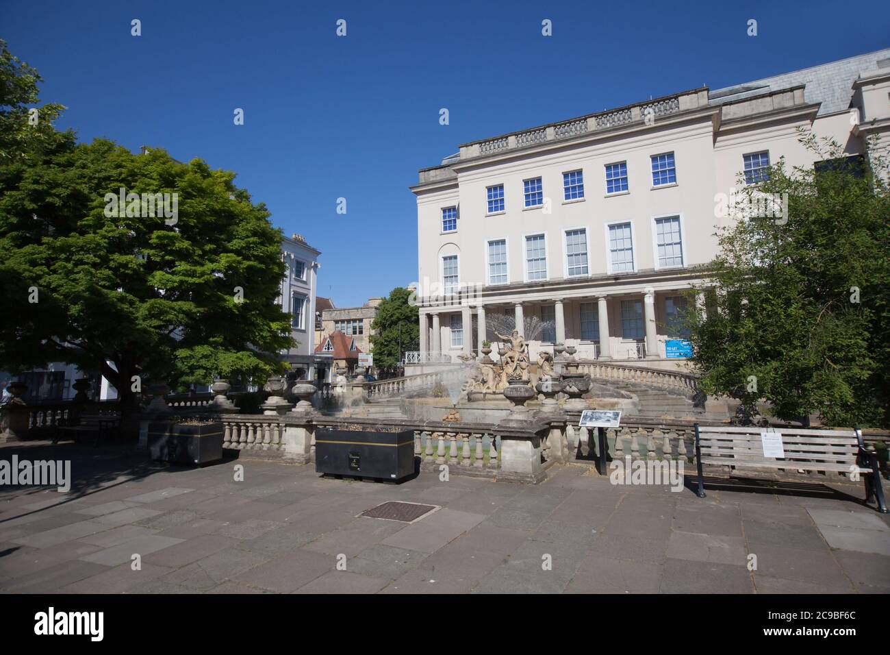 A water fountain of Neptune at the Promenade in Cheltenham ...