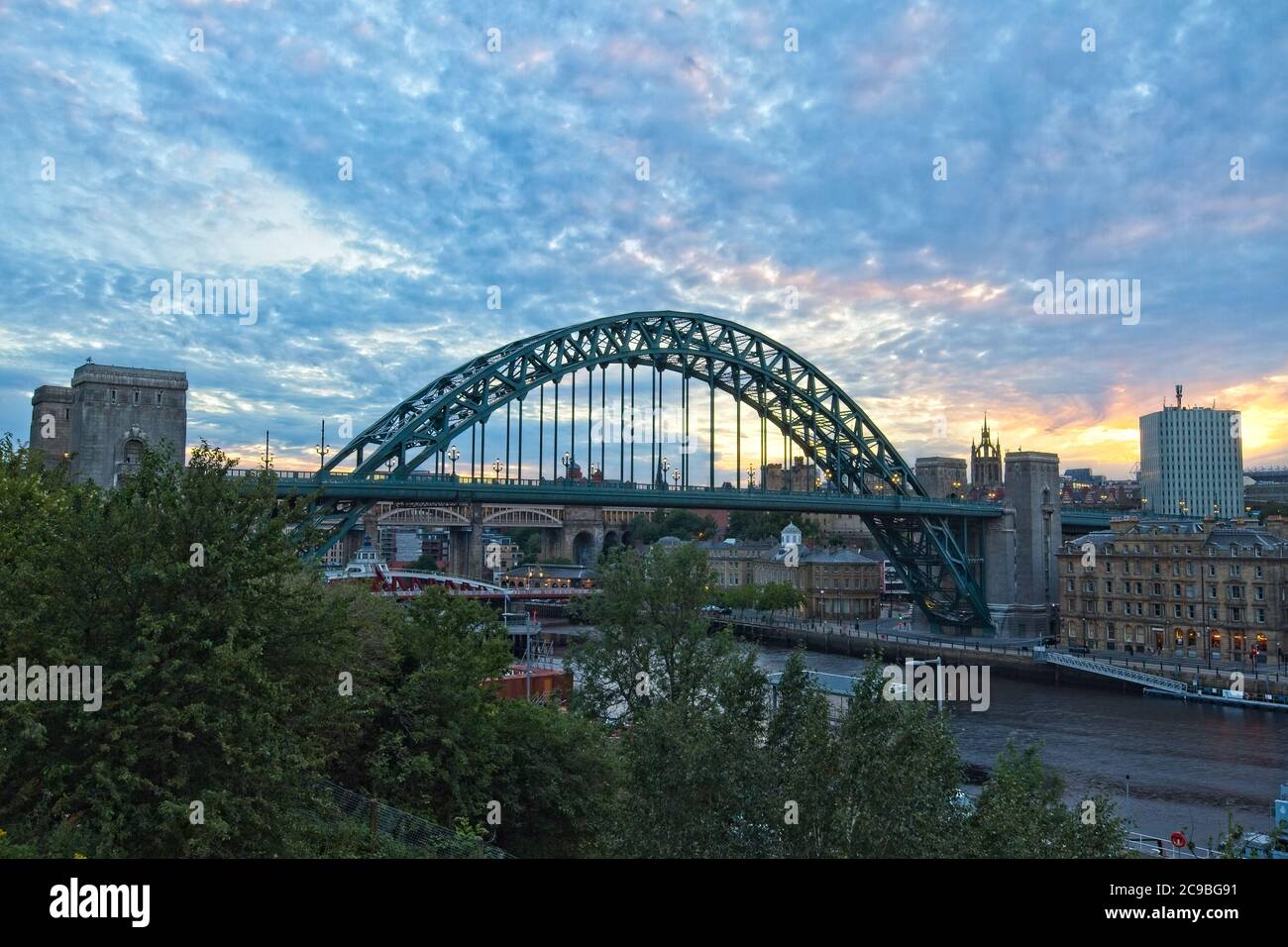 The iconic arch of the Tyne Bridge and quayside in Newcastle, Tyne and ...