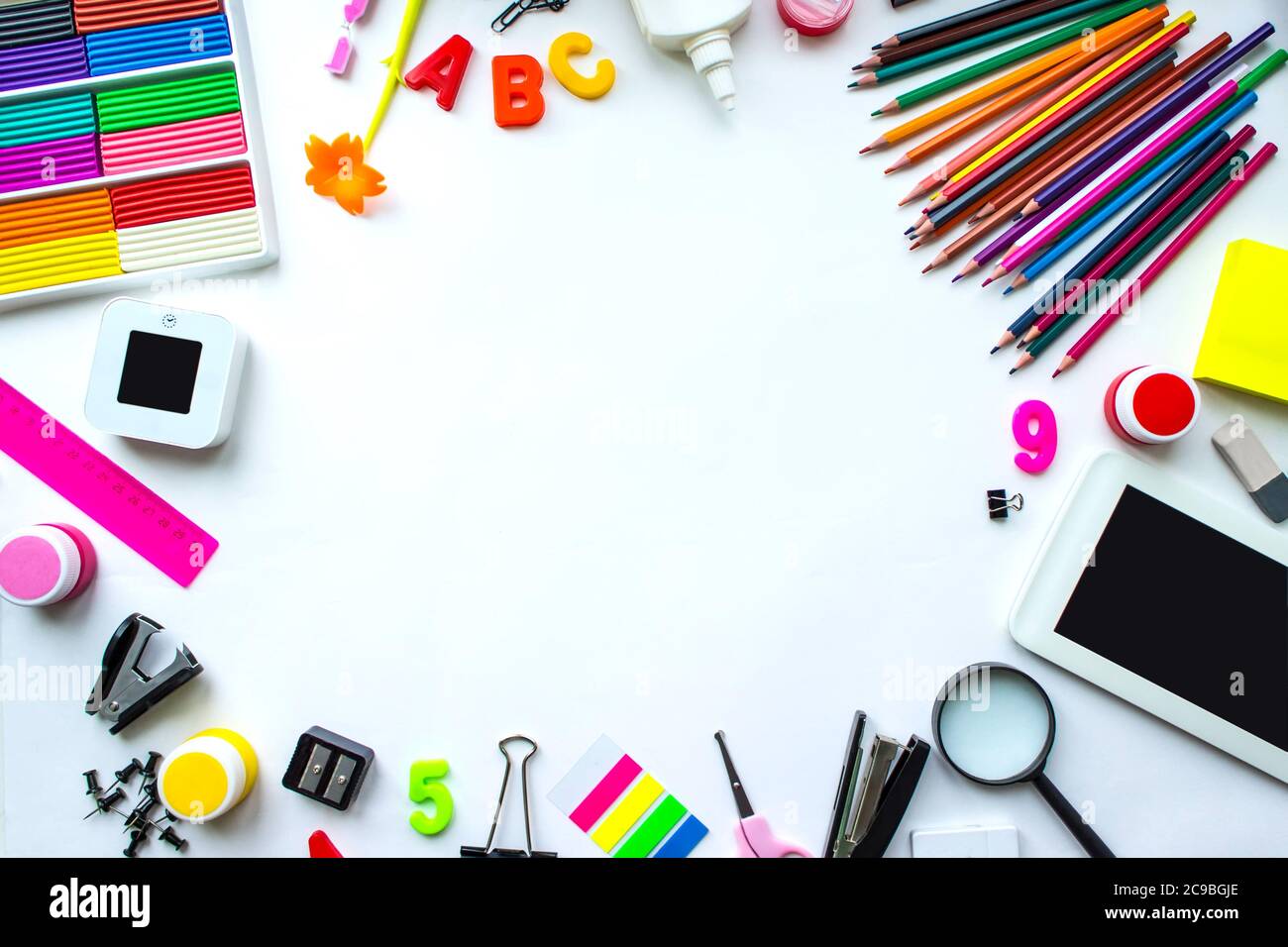 School notebook and various stationery with copy space. School supplies ...