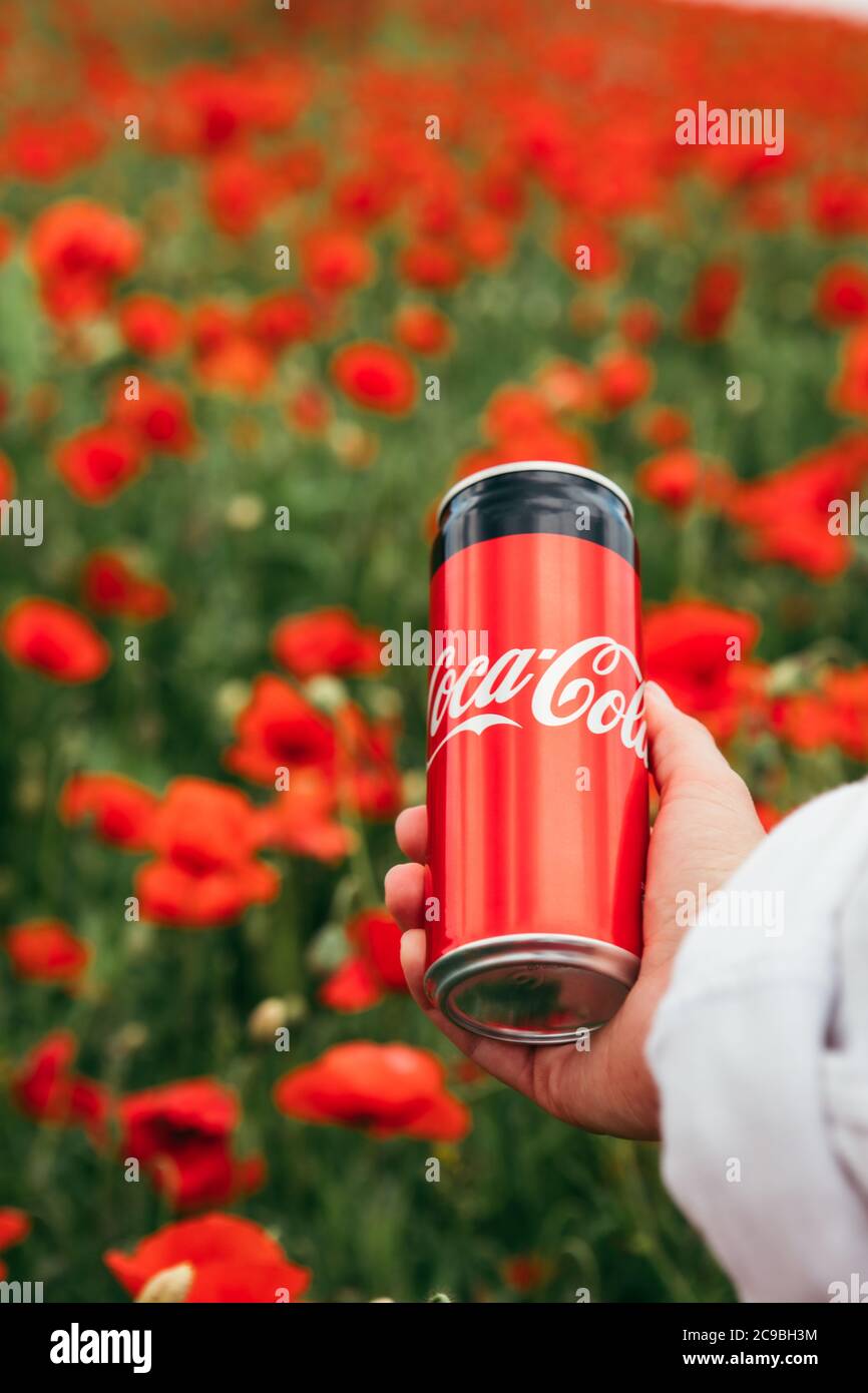 Hand holding coca cola bottle hi-res stock photography and images - Alamy