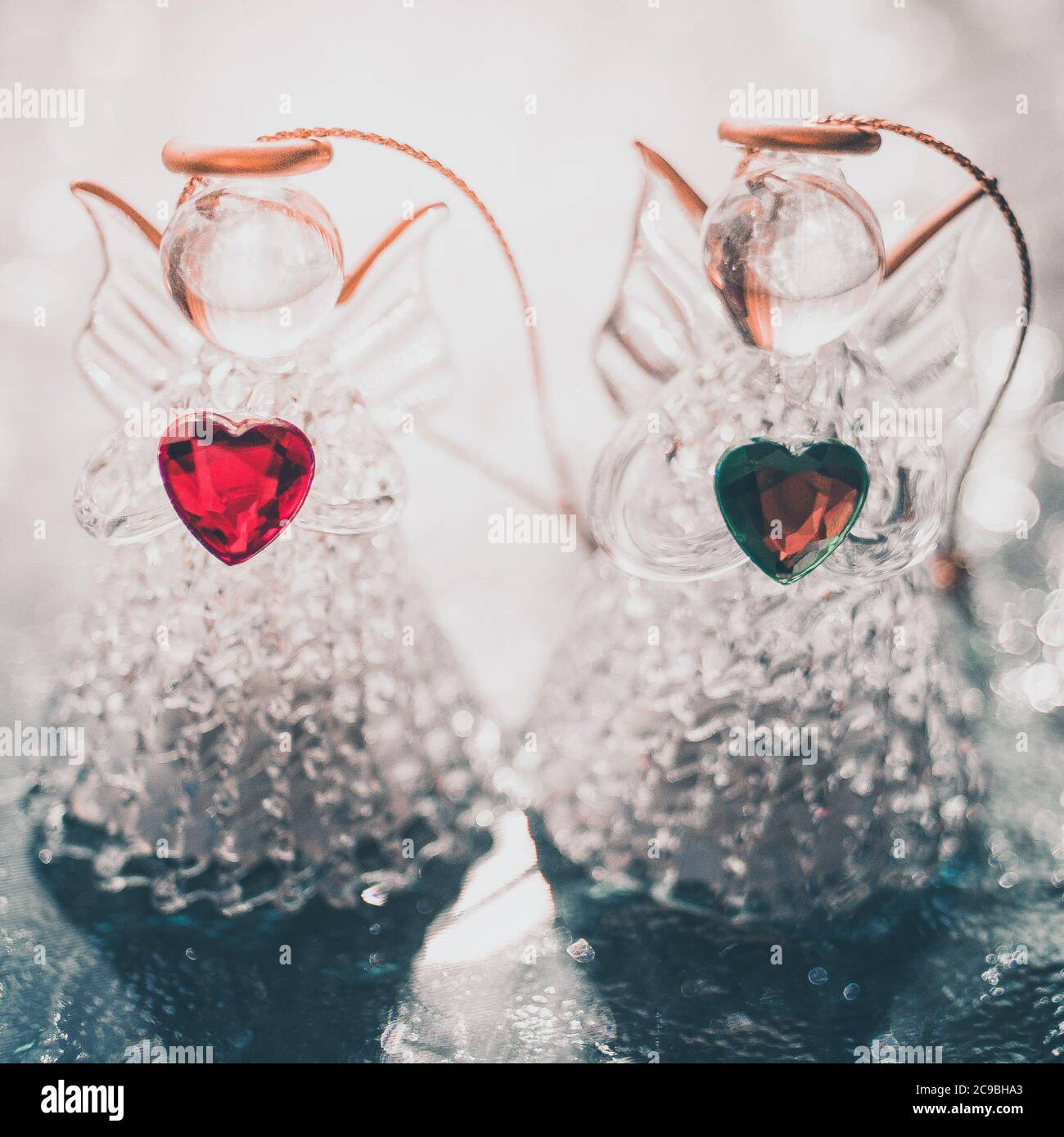 Two angels support hi-res stock photography and images - Alamy