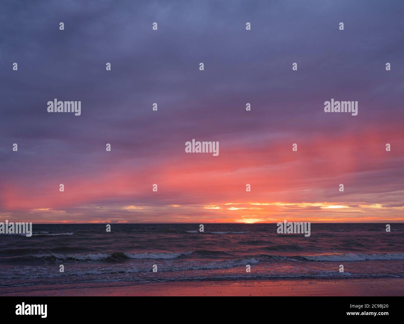colorful sunset on beach of normandy in france Stock Photo - Alamy