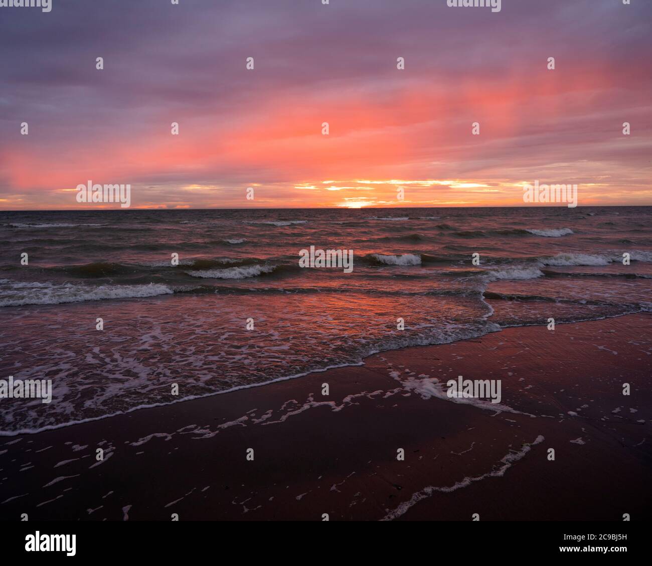 colorful sunset on beach of normandy in france Stock Photo - Alamy