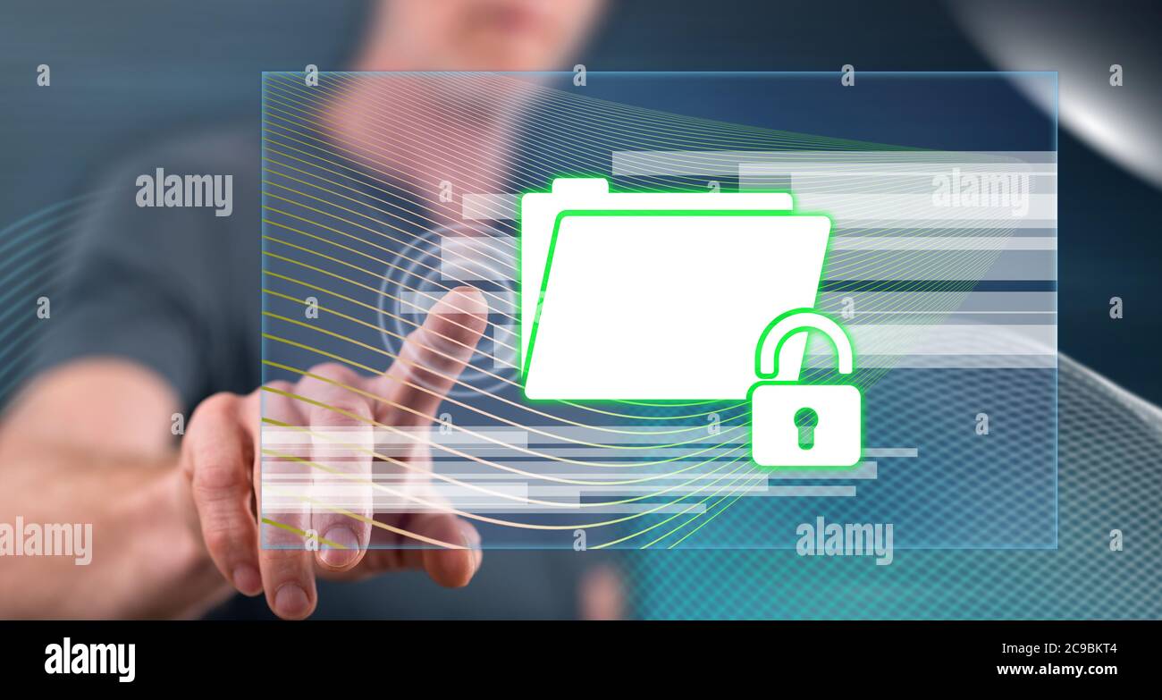 Man touching a data protection concept on a touch screen with his ...