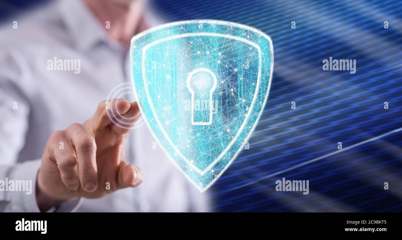 Man touching a digital security concept on a touch screen with his ...