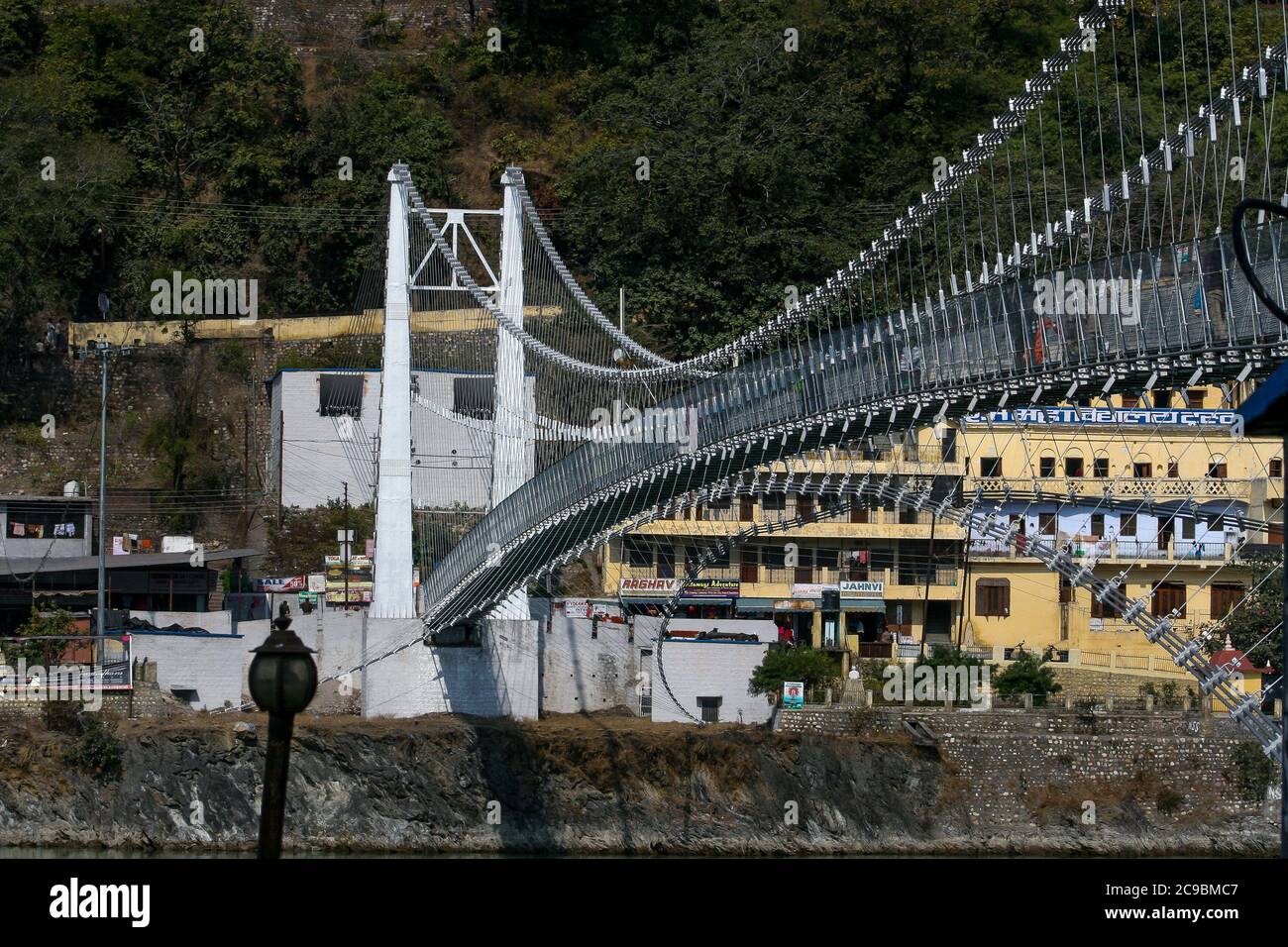 Ram Jhula is a suspension bridge across the river Ganges, Rishikesh and ...