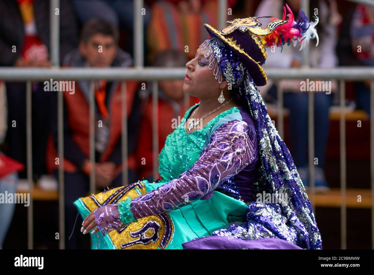 Members of a Waca Waca dance group in ornate costume parade through the ...