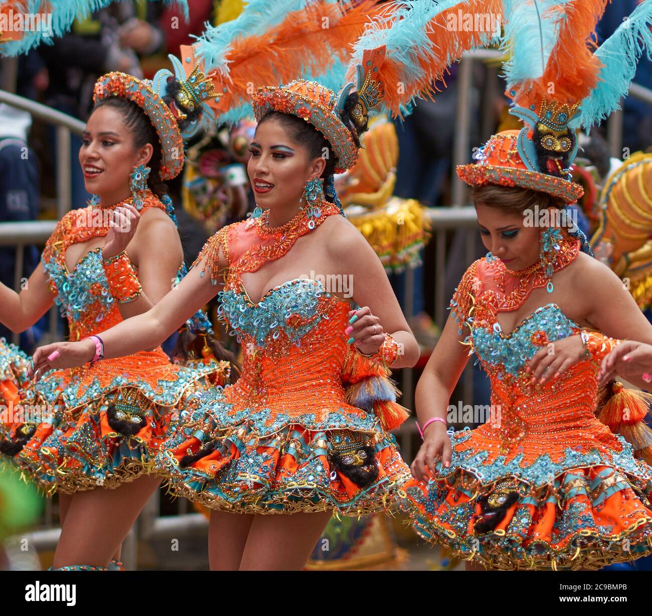 Morenada dancers in ornate costumes parade through the mining city of ...