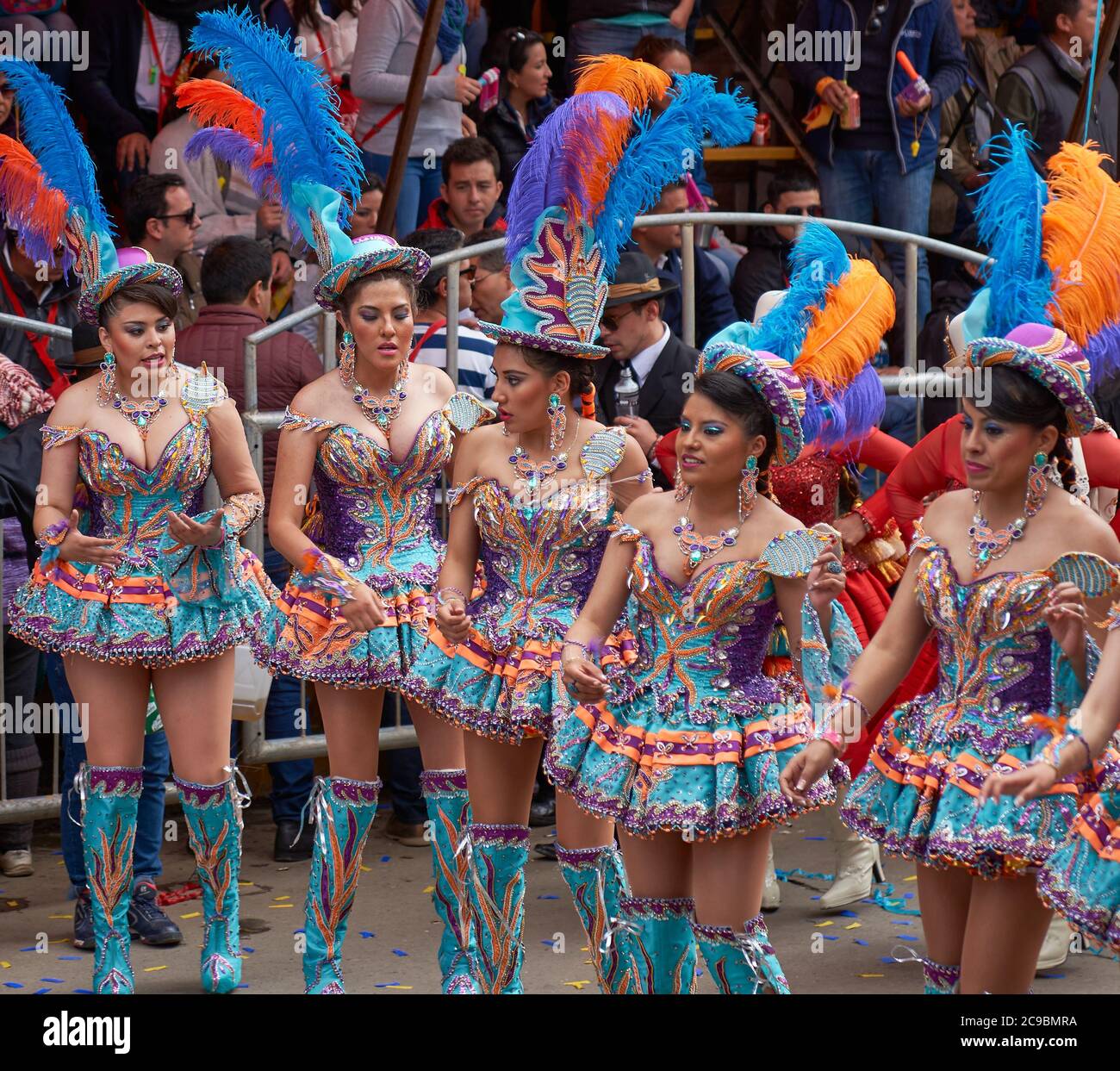 Morenada dancers in ornate costumes parade through the mining city of ...