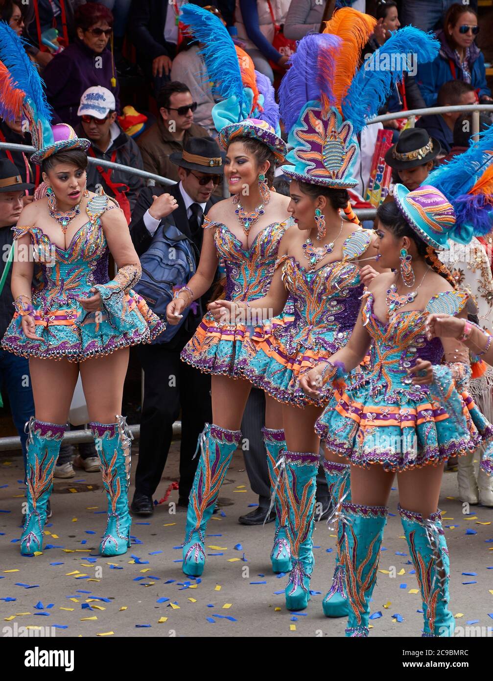 Morenada dancers in ornate costumes parade through the mining city of ...