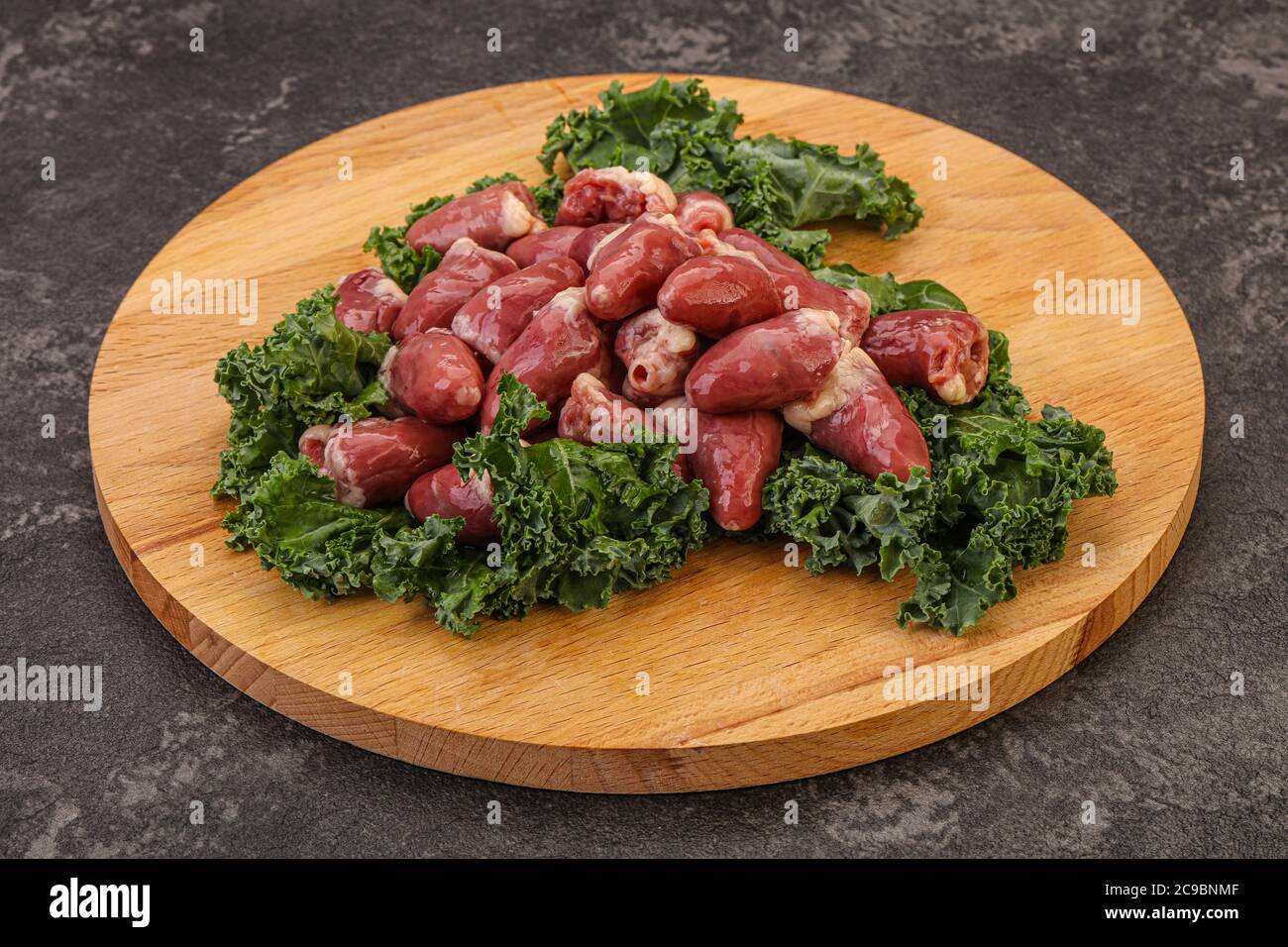 Raw chicken hearts heap for cooking Stock Photo - Alamy
