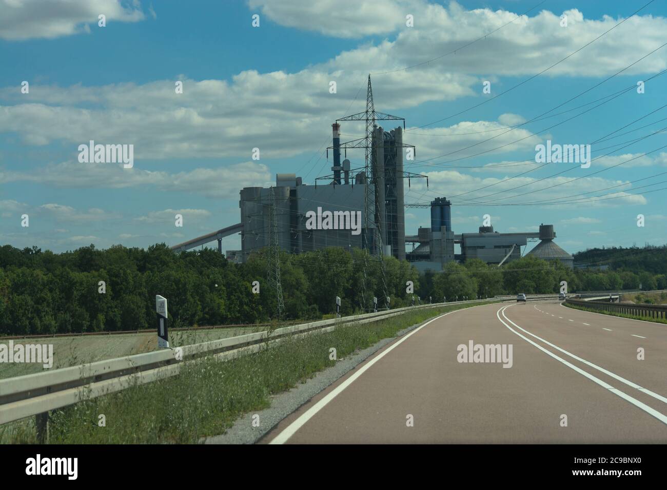 Power station near motorway in Germany Stock Photo - Alamy