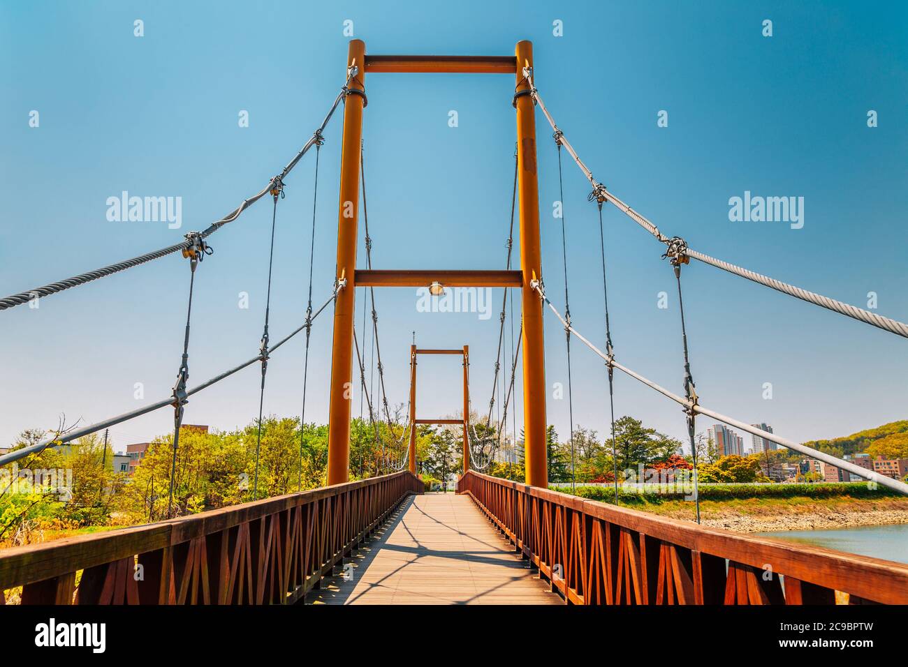 Wooden bridge at Cheonho lake park in Cheonan, Korea Stock Photo - Alamy