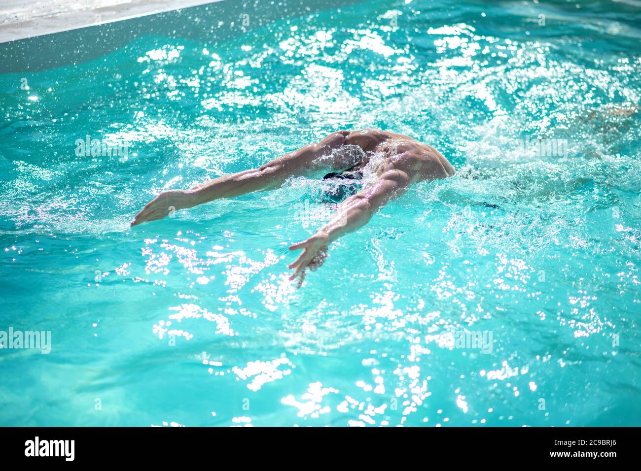 Swimmer underwater while swimming in the pool Stock Photo - Alamy