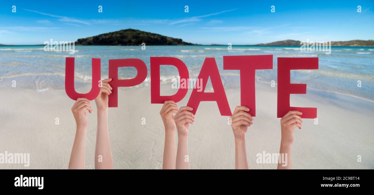 People Hands Holding Word Update, Ocean Background Stock Photo - Alamy