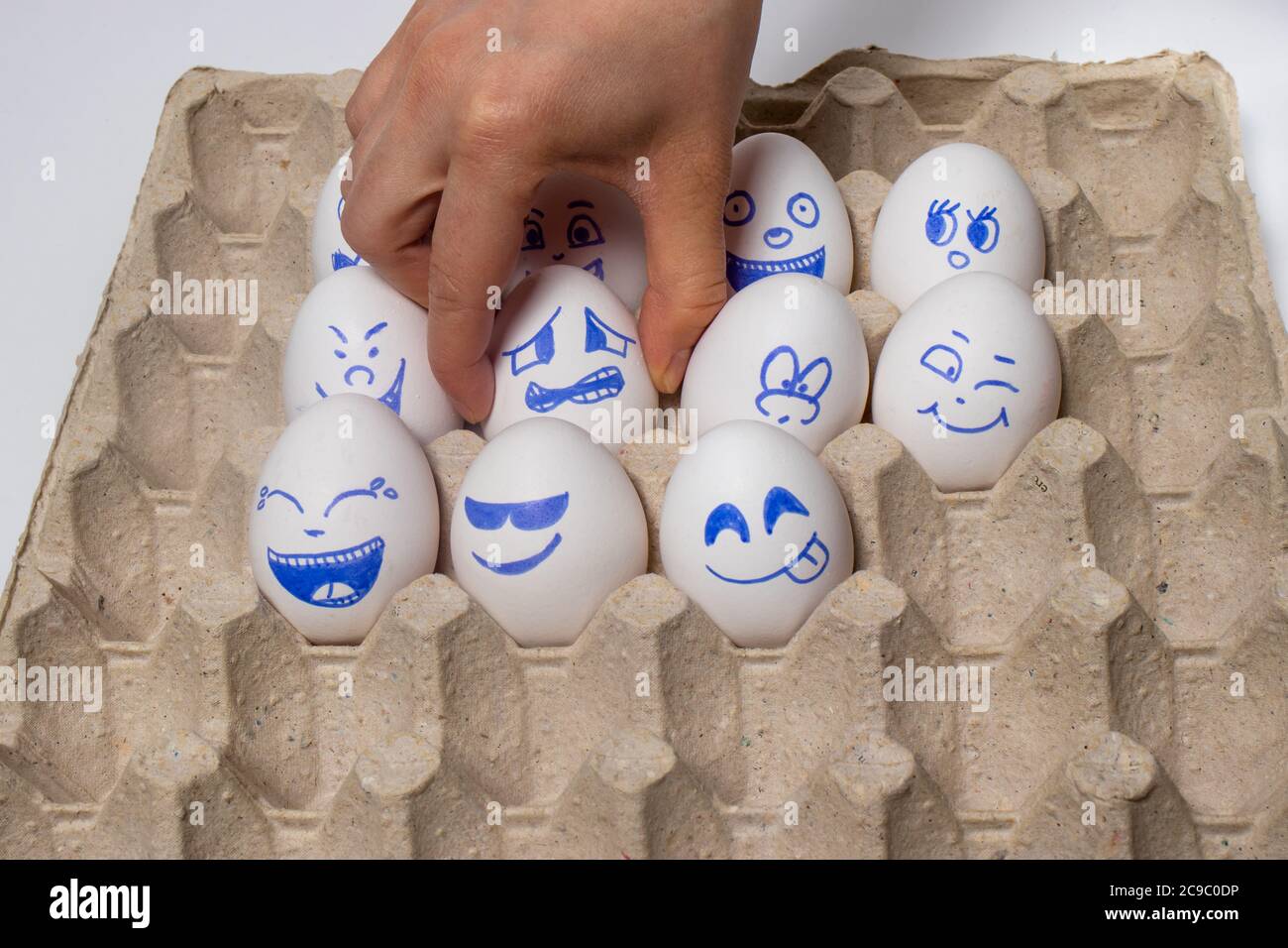 Funny chicken eggs. Smiley eggs with faces, funny faces. Eggs with ...