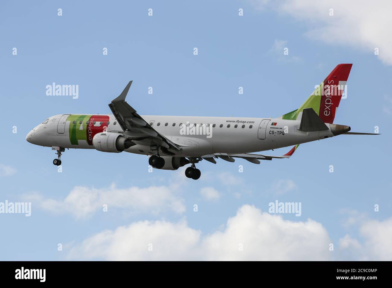 An Embraer E190LR flying for TAP Express lands at London Heathrow ...