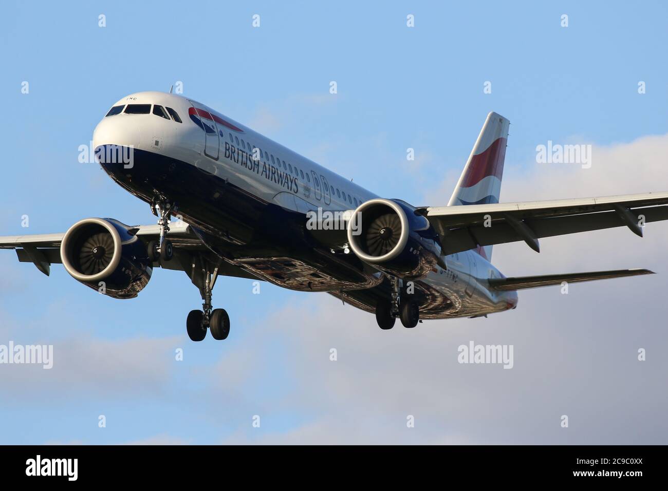 An Airbus Airbus A320-251N flying for British Airways lands at London Heathrow Airport Stock ...