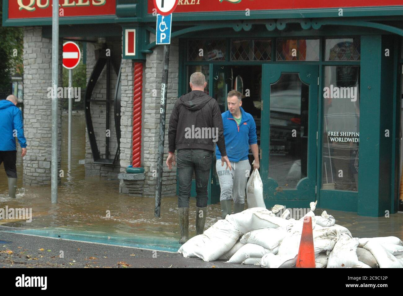 Fire brigade emergency services ladders fire damage hi-res stock ...