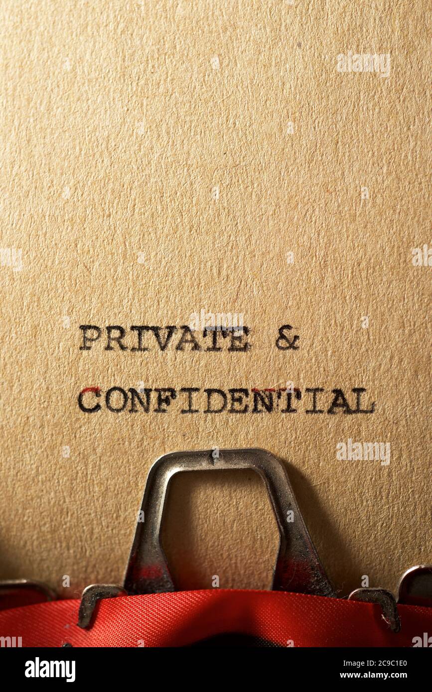 Private & Confidential text written with a typewriter Stock Photo - Alamy