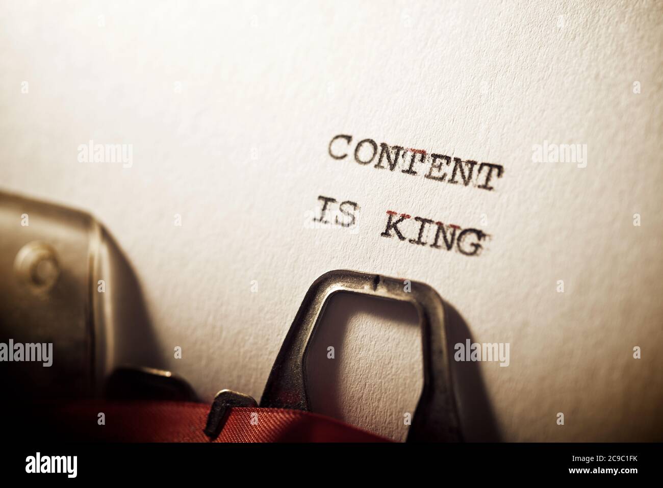 Content is king text written with a typewriter Stock Photo - Alamy