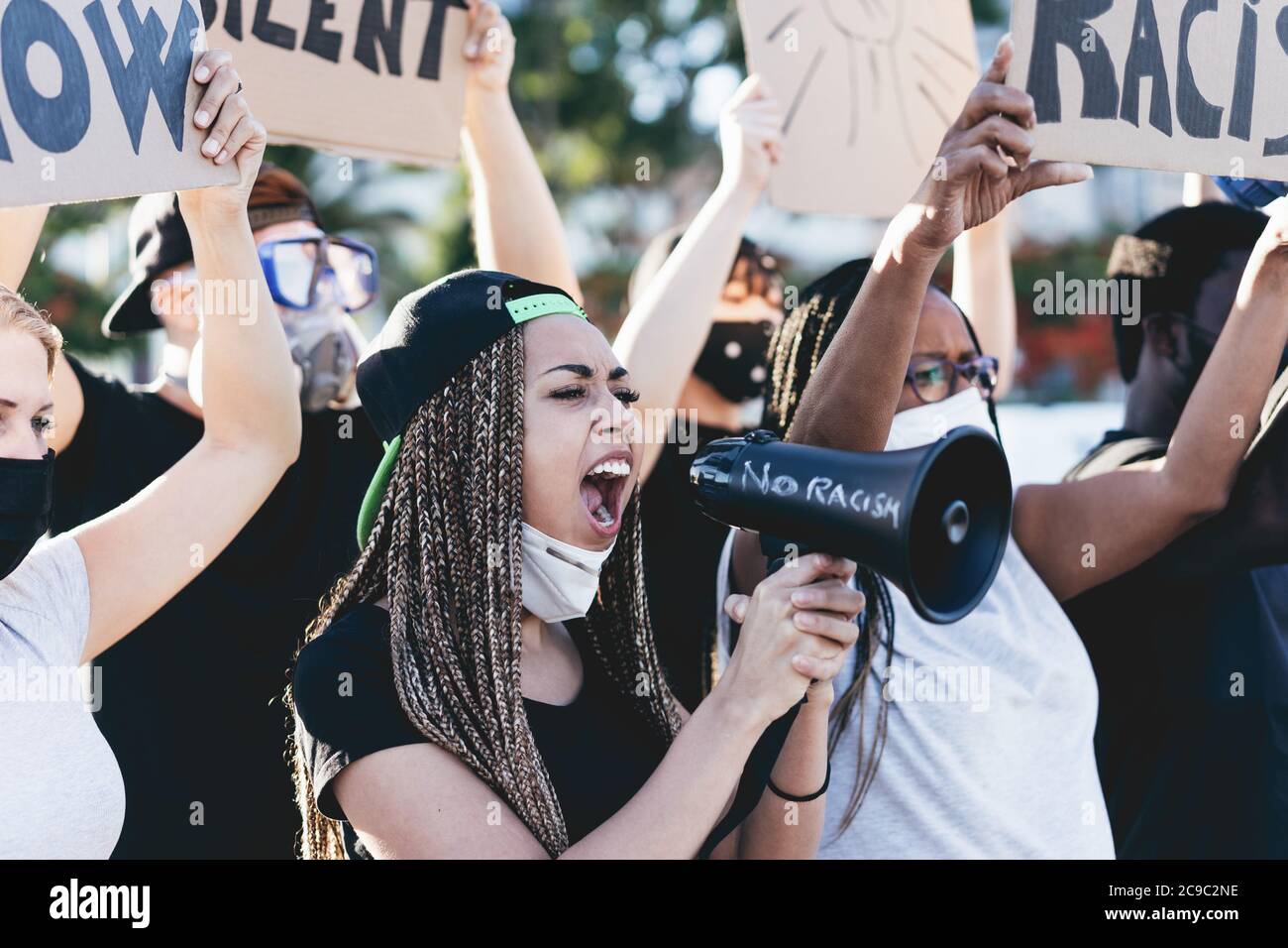People from different ages and races protest on the street for equal ...