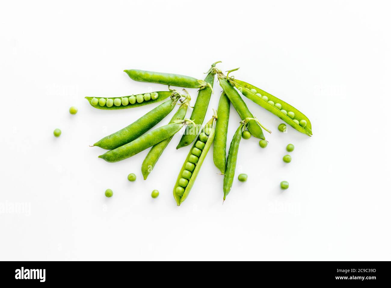 Set of green pea pods isolated on white background Stock Photo - Alamy