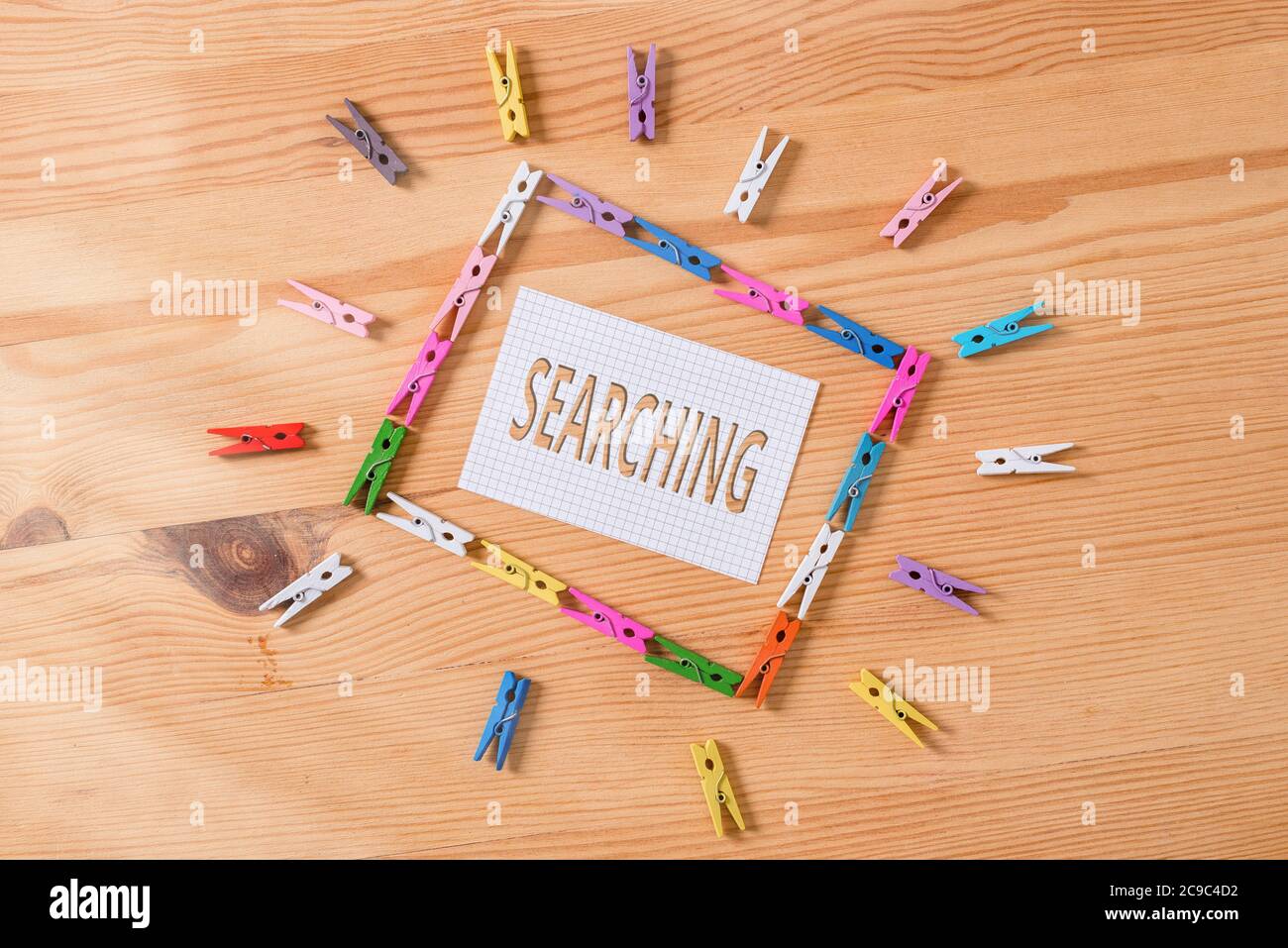 Writing note showing Searching. Business concept for look into or over ...